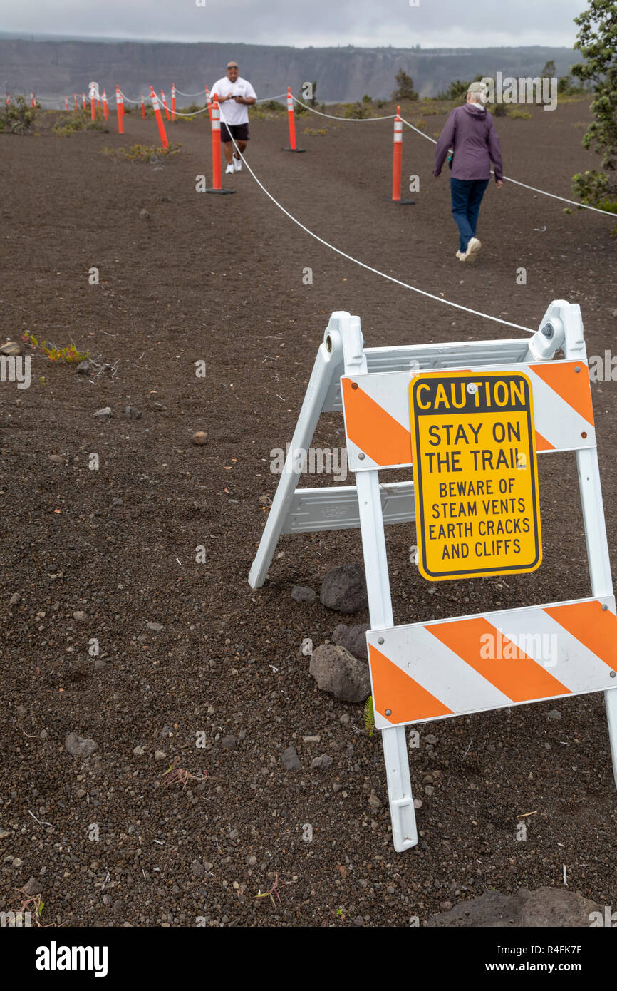 Hawaii Volcanoes National Park, Hawaii - A sign warns visitors about ...