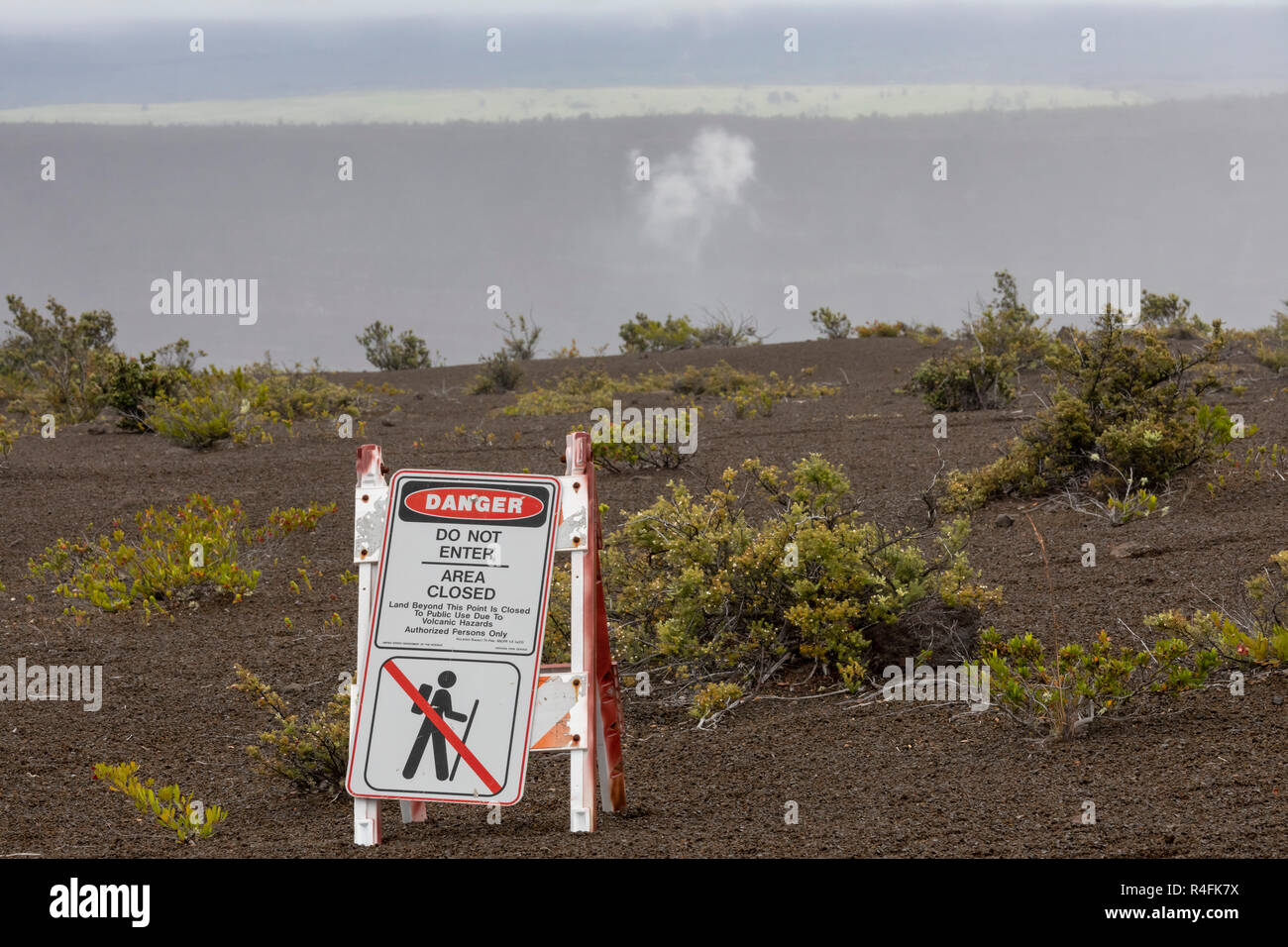 Hawaii Volcanoes National Park, Hawaii - A sign warns visitors about ...
