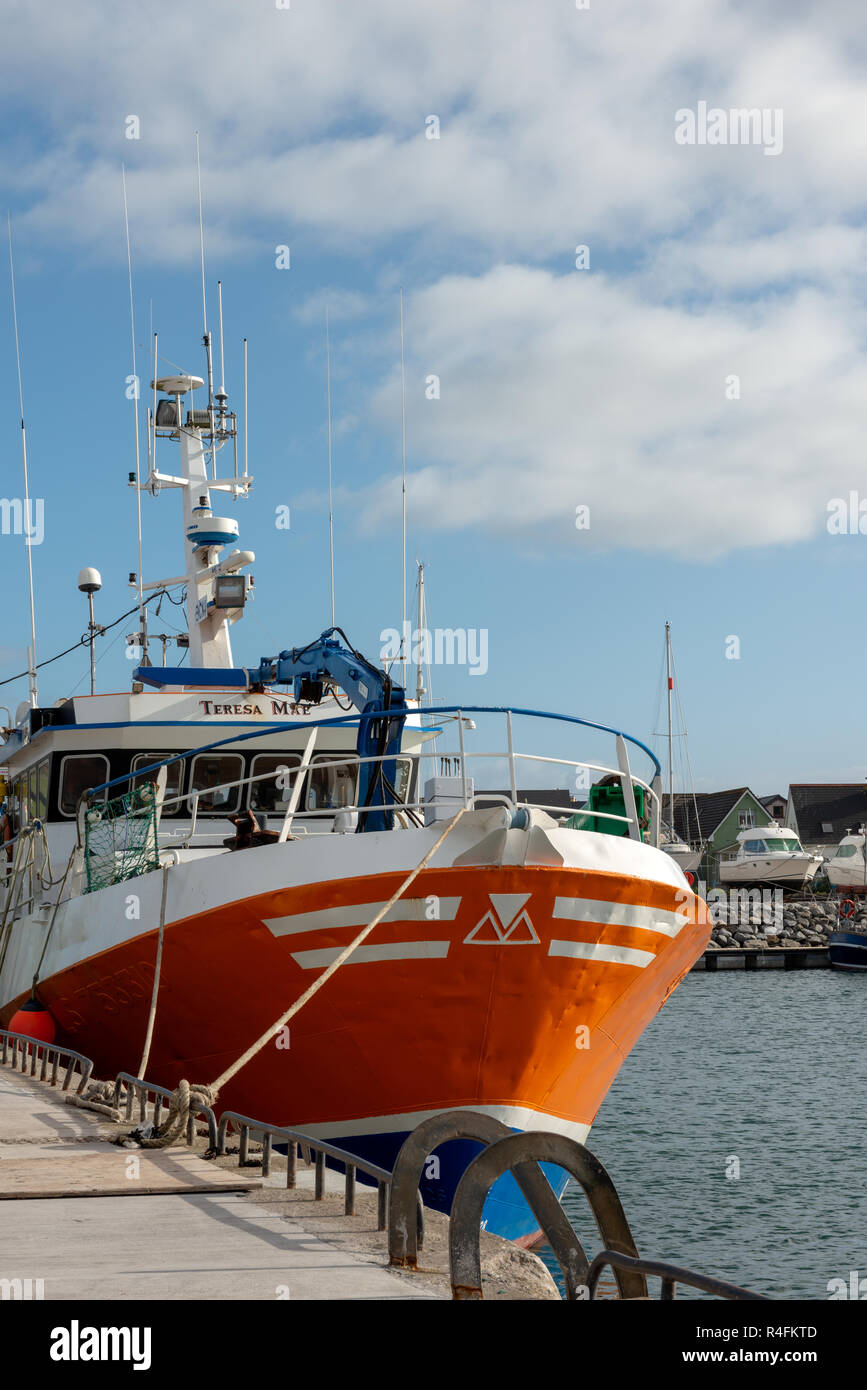 Orange fishing ship boat Teresa Mae moored in Dingle harbour, Dingle ...