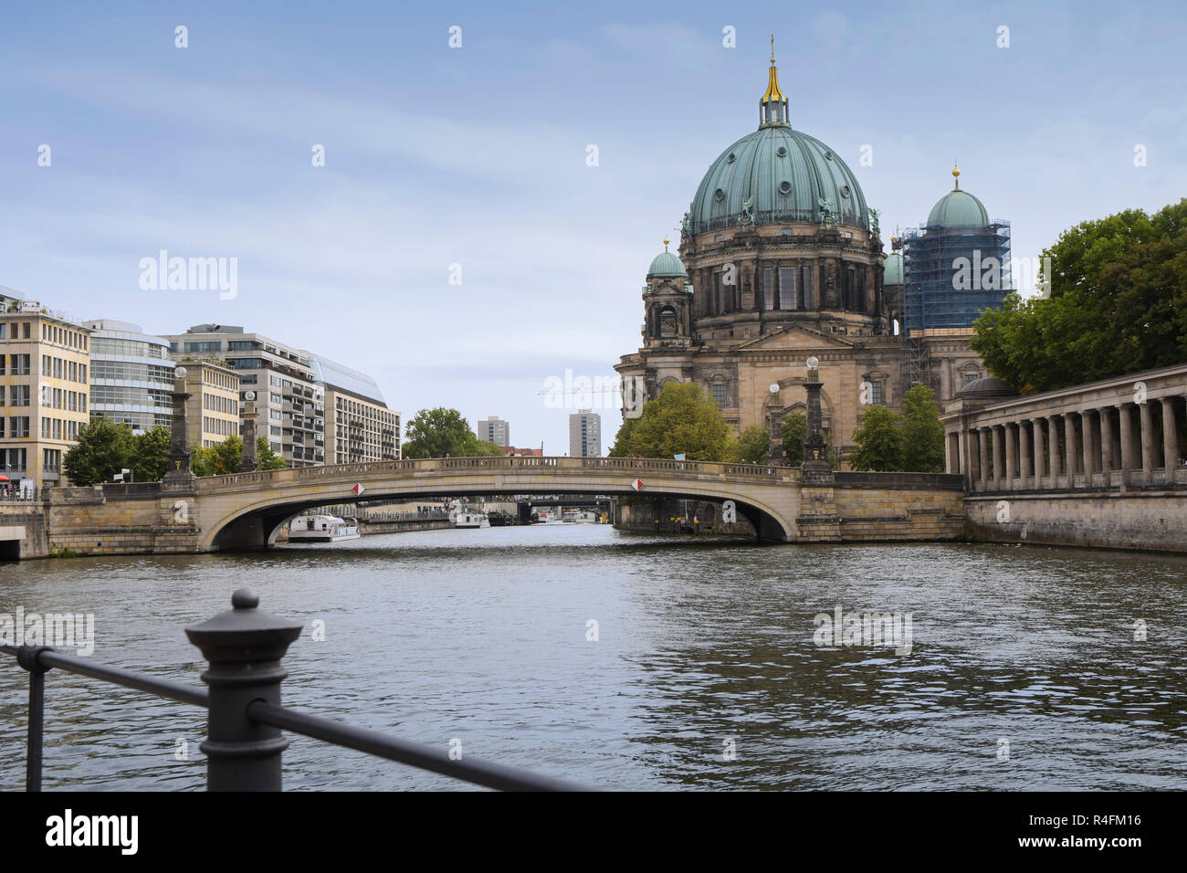 berliner dom (berlin cathedral) and bridge on the river spree against a ...