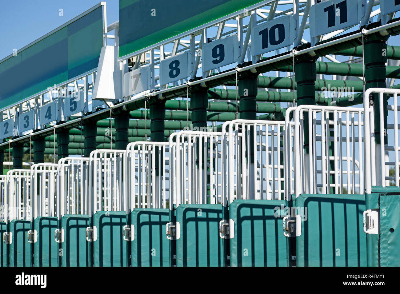 horse race start gates with numbers on a sunny day Stock Photo - Alamy