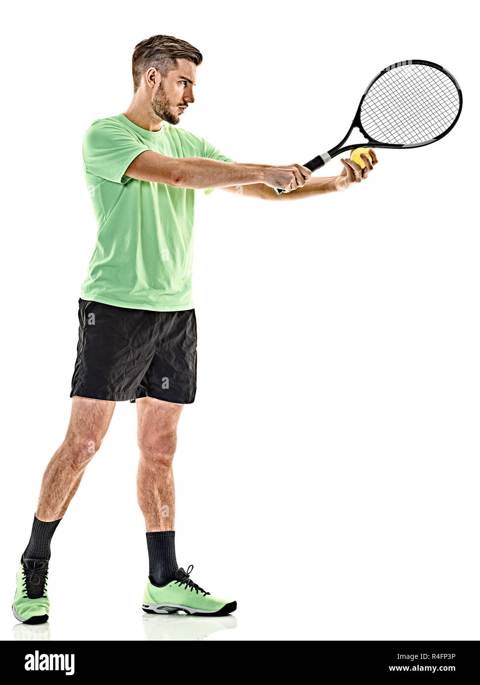 one caucasian man playing tennis player service serving isolated on ...