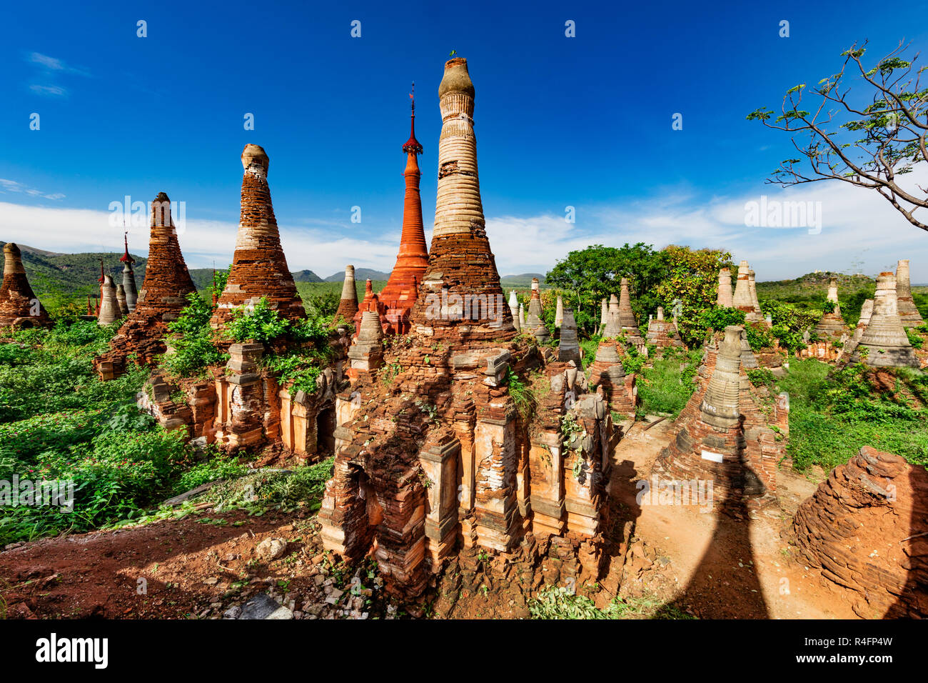 stupas of the Shwe Inn Dein Pagoda at Inle Lake Shan state in Myanmar ...