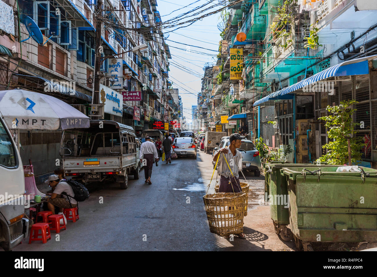 YANGON, MYANMAR -NOVEMBER 25, 2016 : downtown city street of Yangon ...