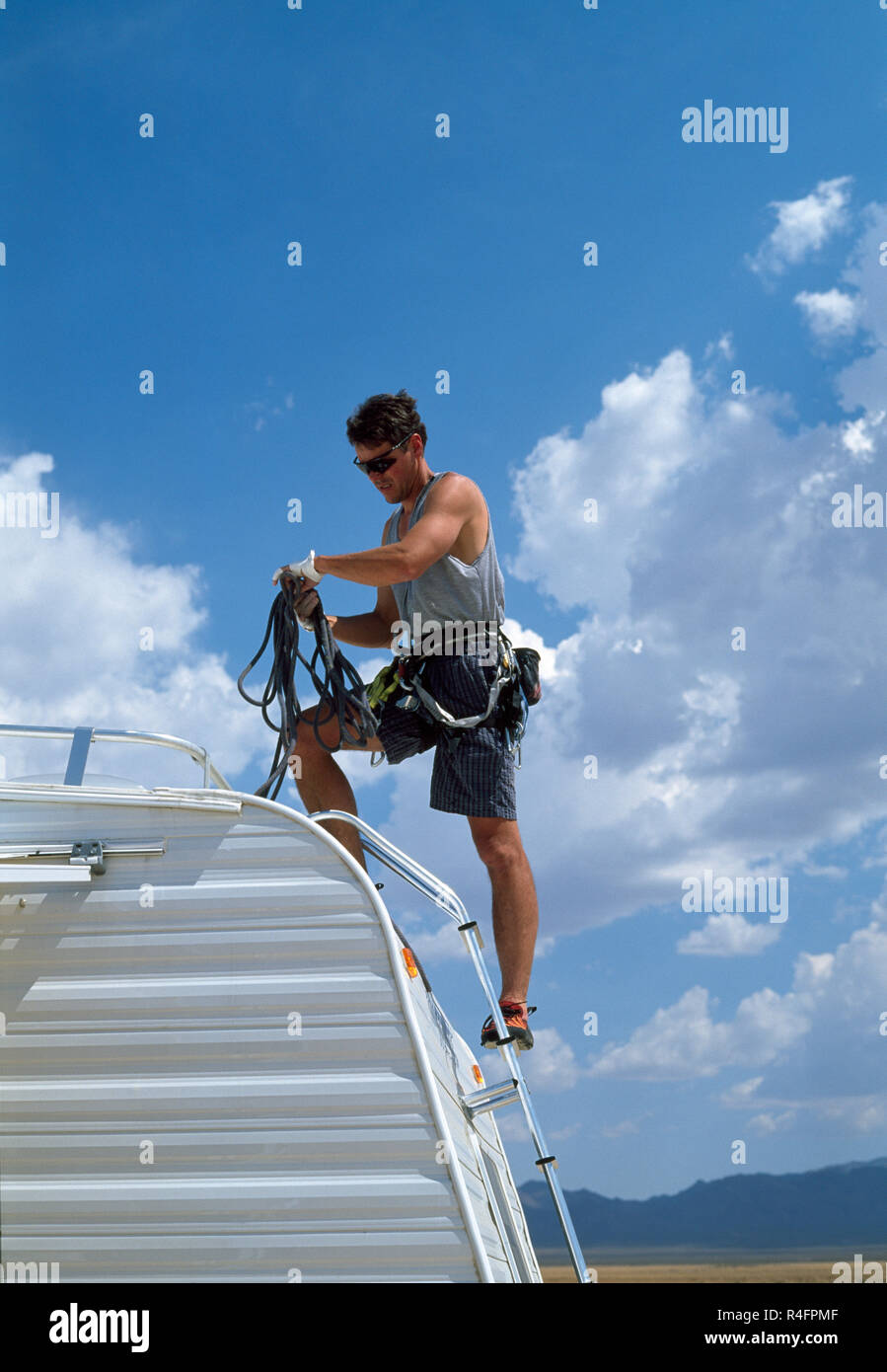 Man ladder desert hi-res stock photography and images - Alamy