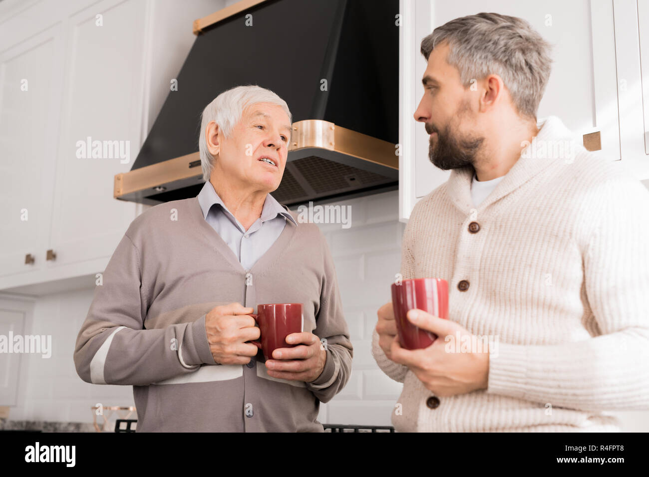 Dad and son talking hi-res stock photography and images - Alamy