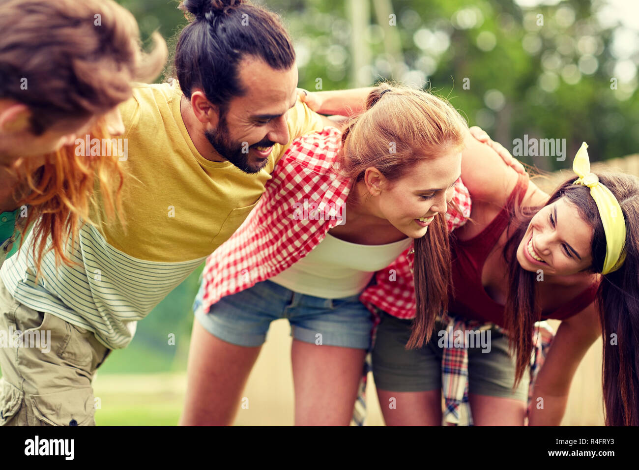 group of smiling friends outdoors Stock Photo - Alamy