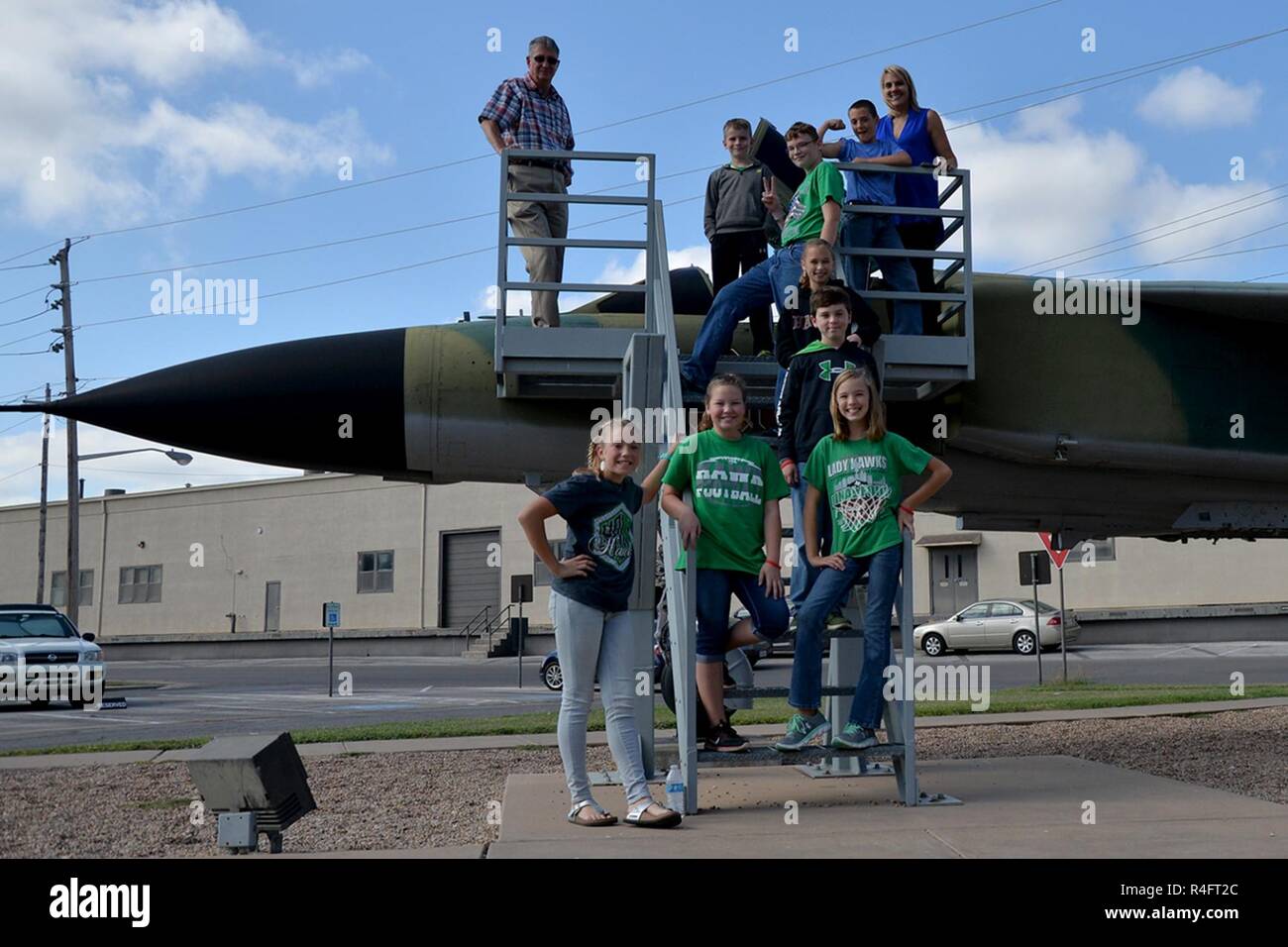 Wall Middle School students stand on a static display of a Russian MiG ...