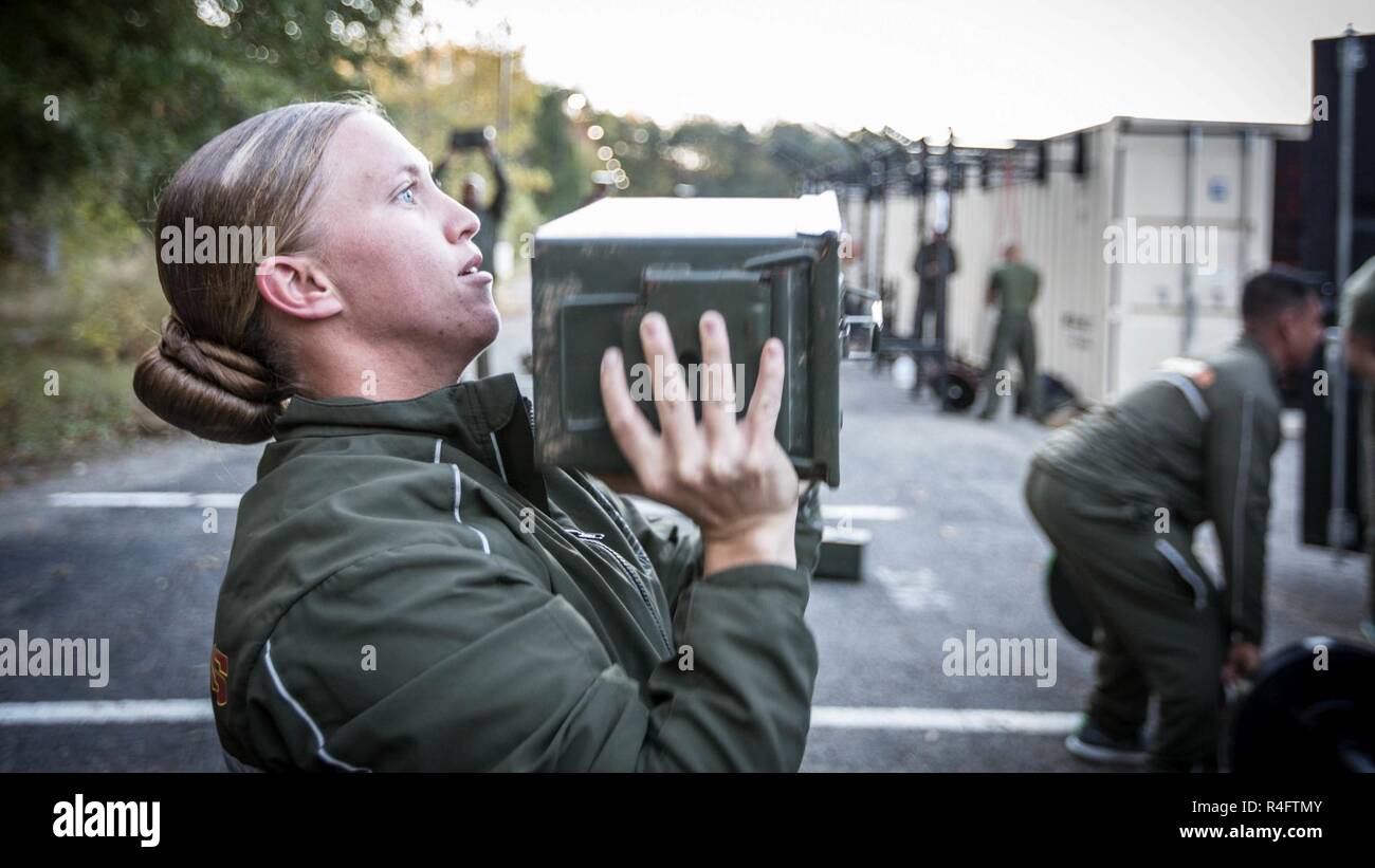 Force Fitness Instructor (FFI) student executes proper ammo can lift ...