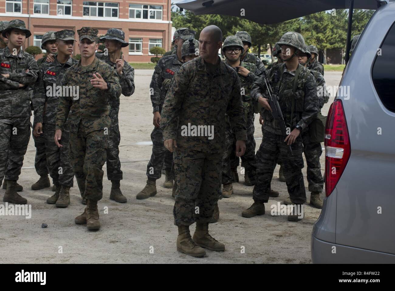 U.S. Marines with Lima Company, 3rd Battalion 2nd Marines, instruct ...