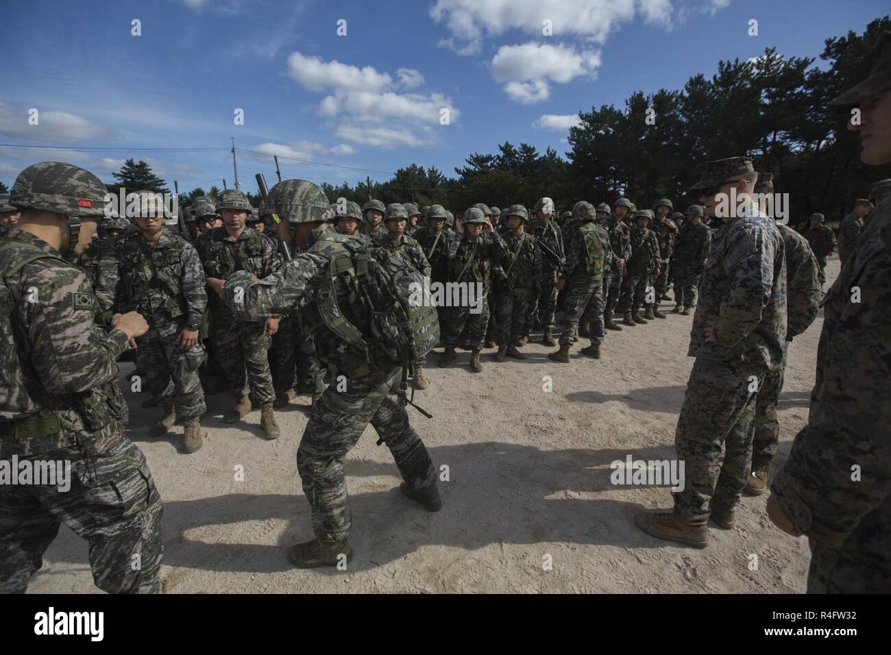 U.S. Marines with Lima Company, 3rd Battalion 2nd Marines, instruct ...