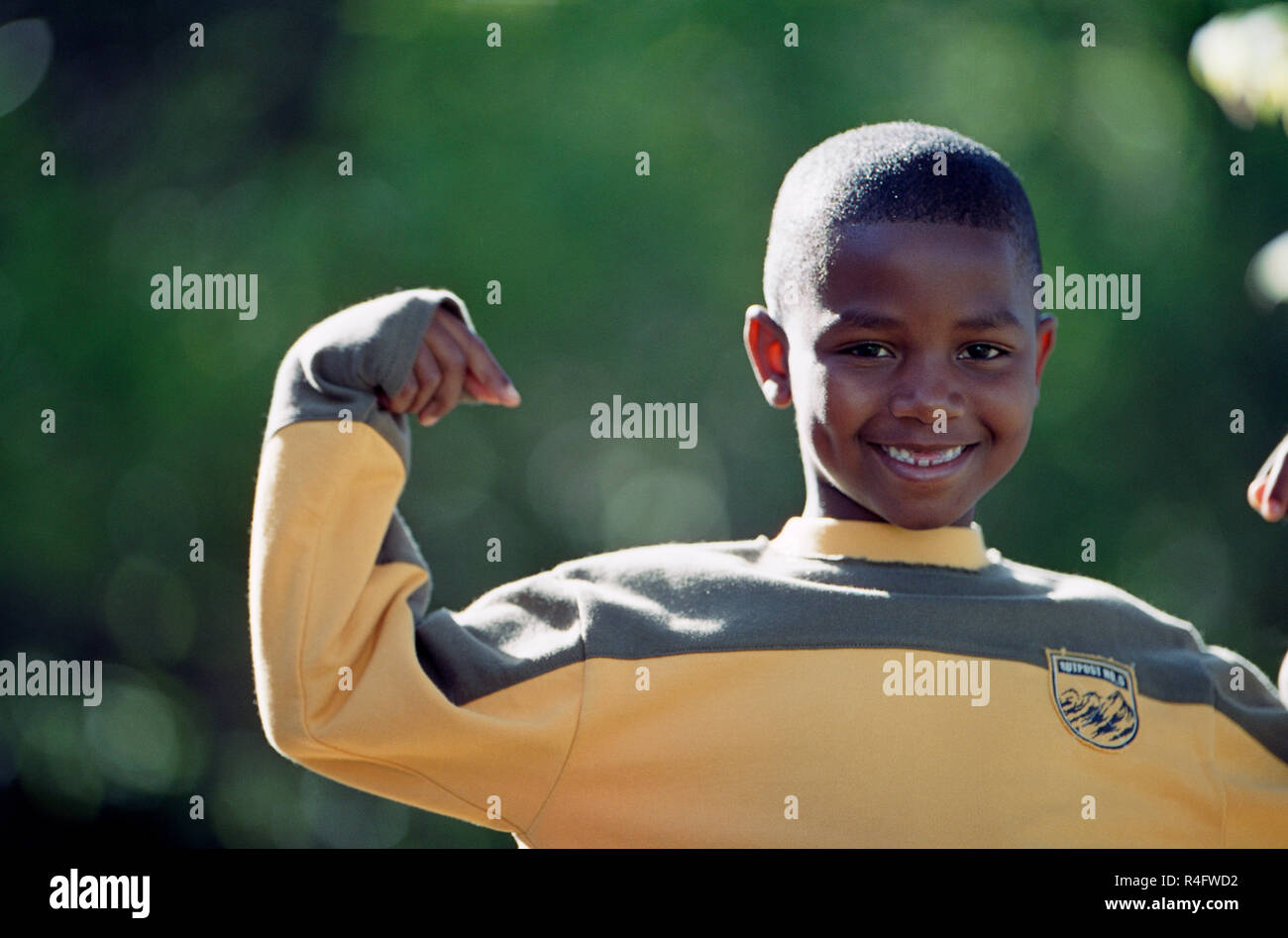 Child flex muscle hi-res stock photography and images - Alamy