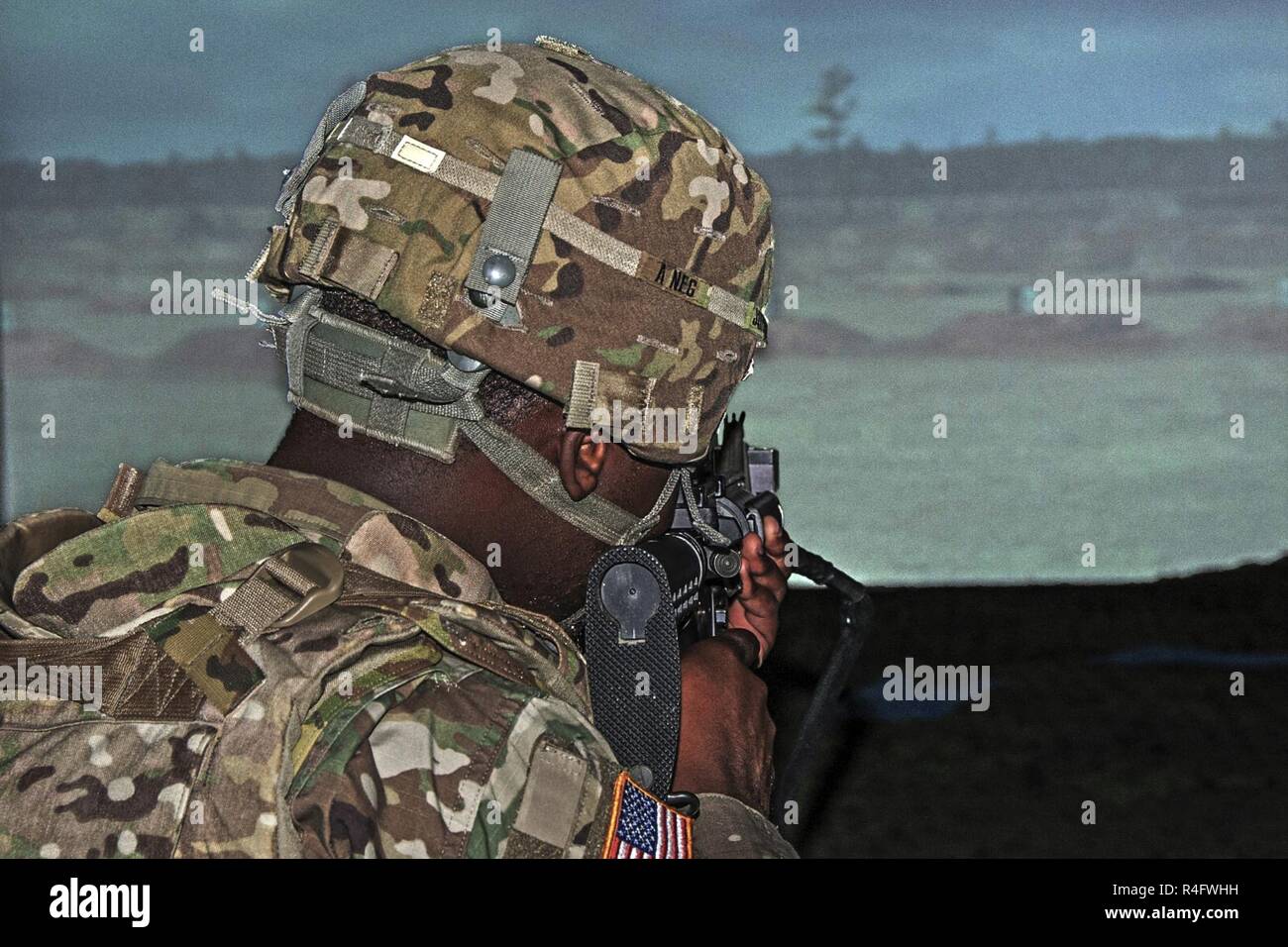 U.S. Army Pfc. Gene K. Imboywa, an aircraft powertrain repairer with ...