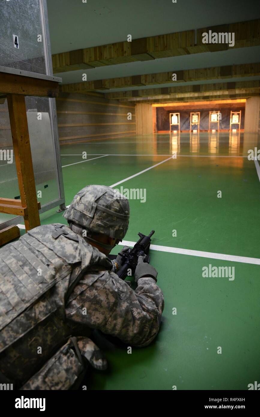U.S. Army Spc. Gabriel Perez, assigned to 39th Signal Battalion, loads ...
