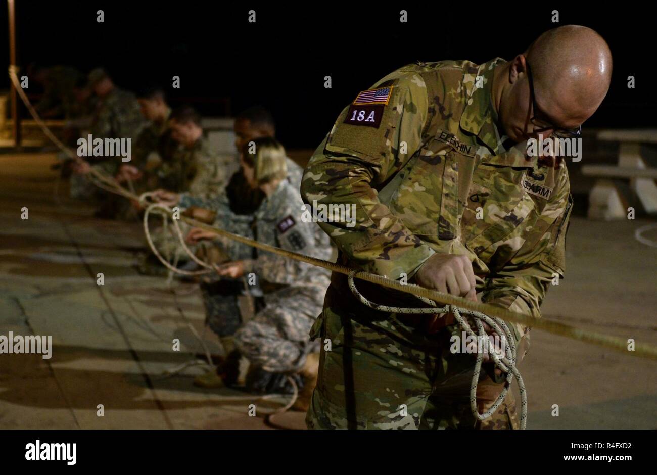 PFC. Zachary Elenchin, representing the 44th Medical Brigade, prepares ...