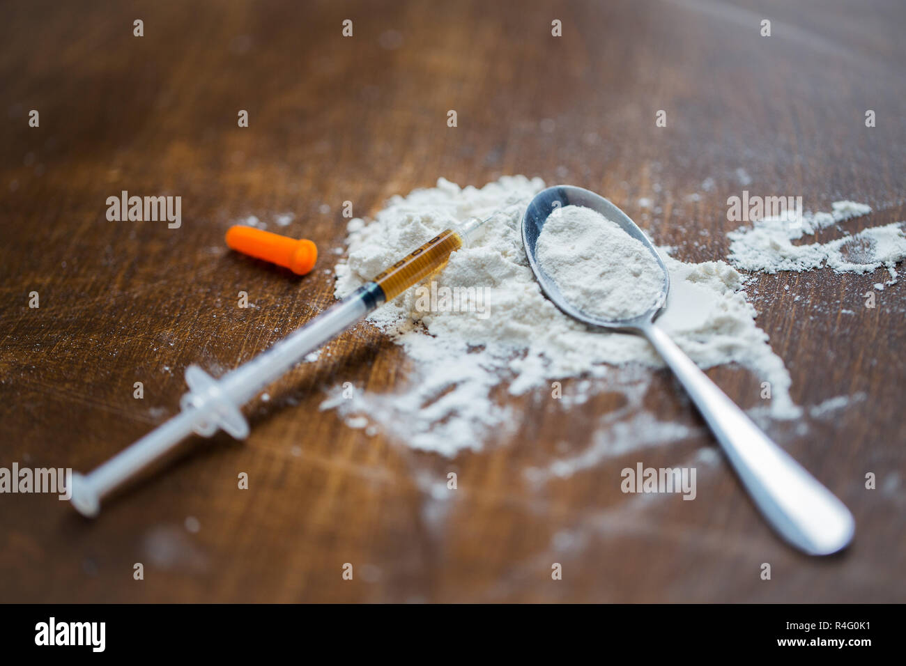 close up of spoon and syringe with drug dose Stock Photo - Alamy
