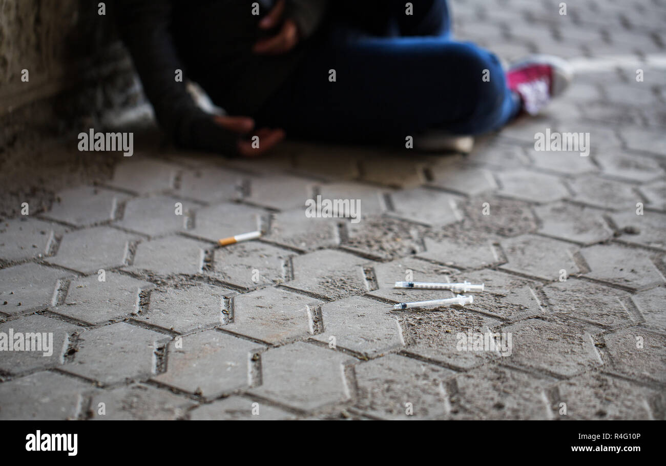close up of addict woman and drug syringes Stock Photo - Alamy
