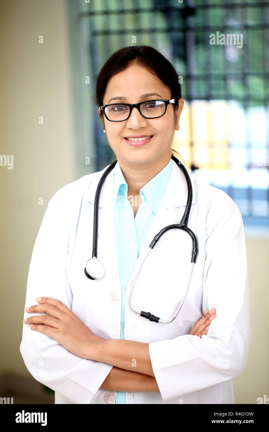 Female doctor in hospital interior Stock Photo - Alamy