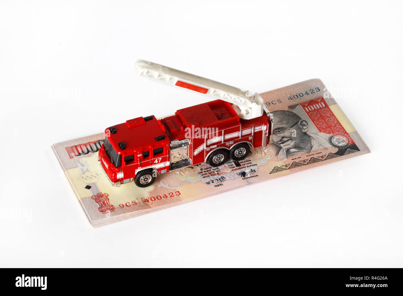 Money on fire £ Cut Out Stock Images & Pictures - Alamy