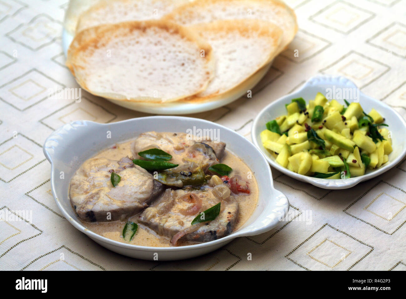 Fish molee and appam Stock Photo - Alamy
