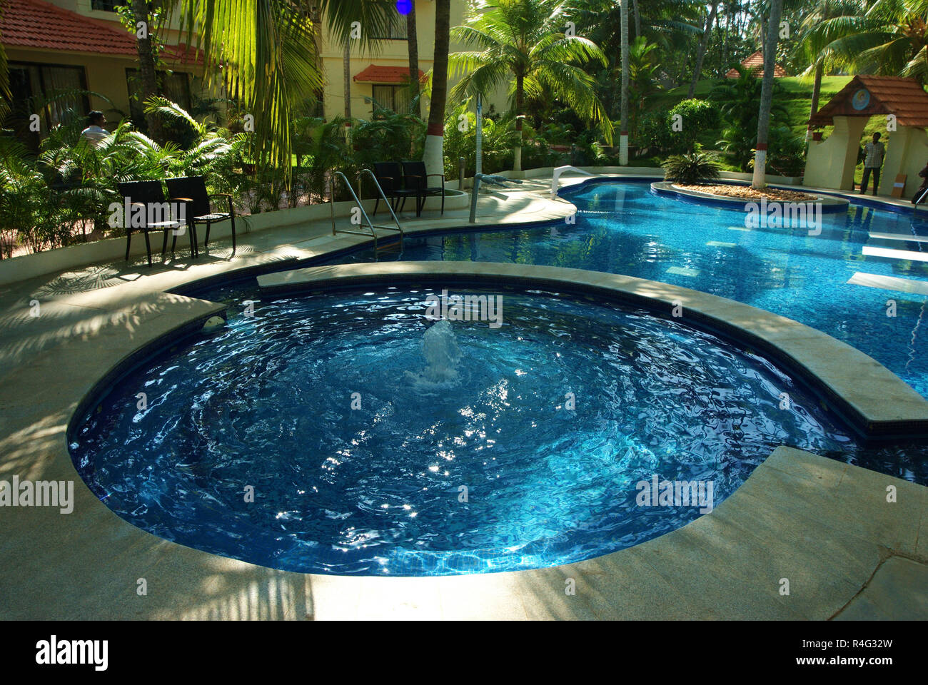 Indian man outdoor swimming pool hi-res stock photography and images ...