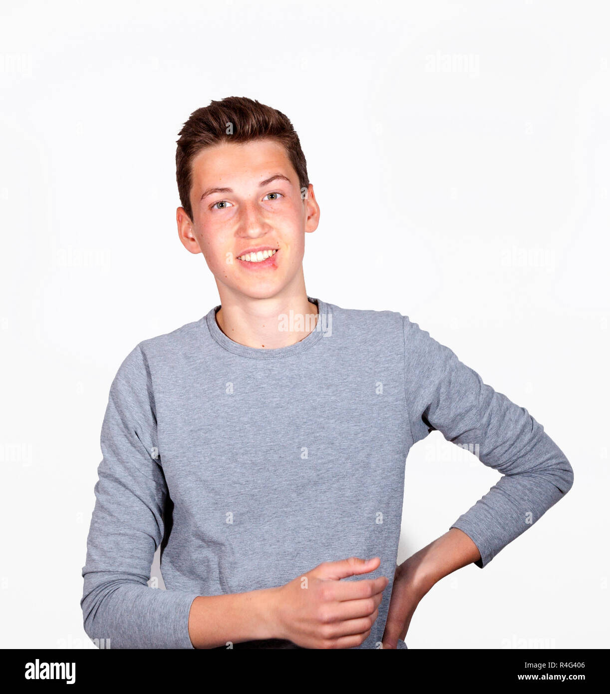 friendly looking teenage boy Stock Photo - Alamy