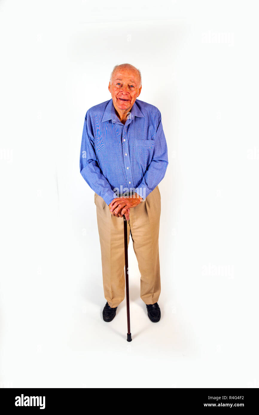 happy elderly man standing with his walking stick Stock Photo - Alamy