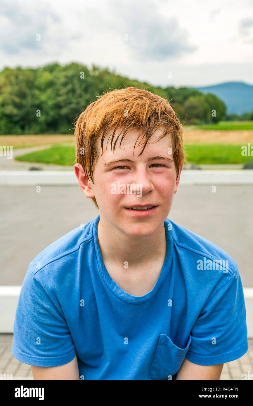 young sweating boy doing sports Stock Photo - Alamy