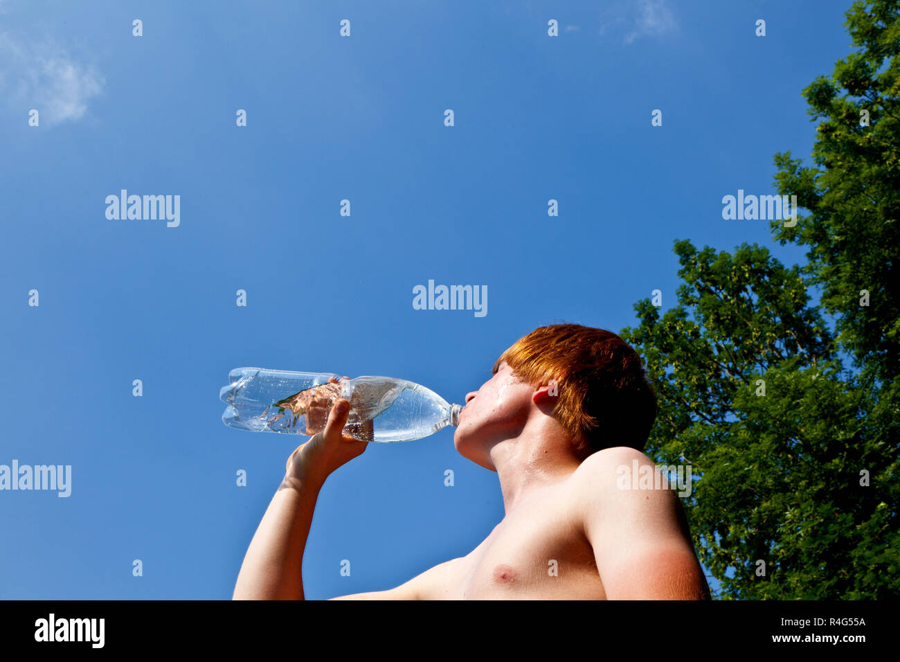 Child sweating drink water hi-res stock photography and images - Alamy