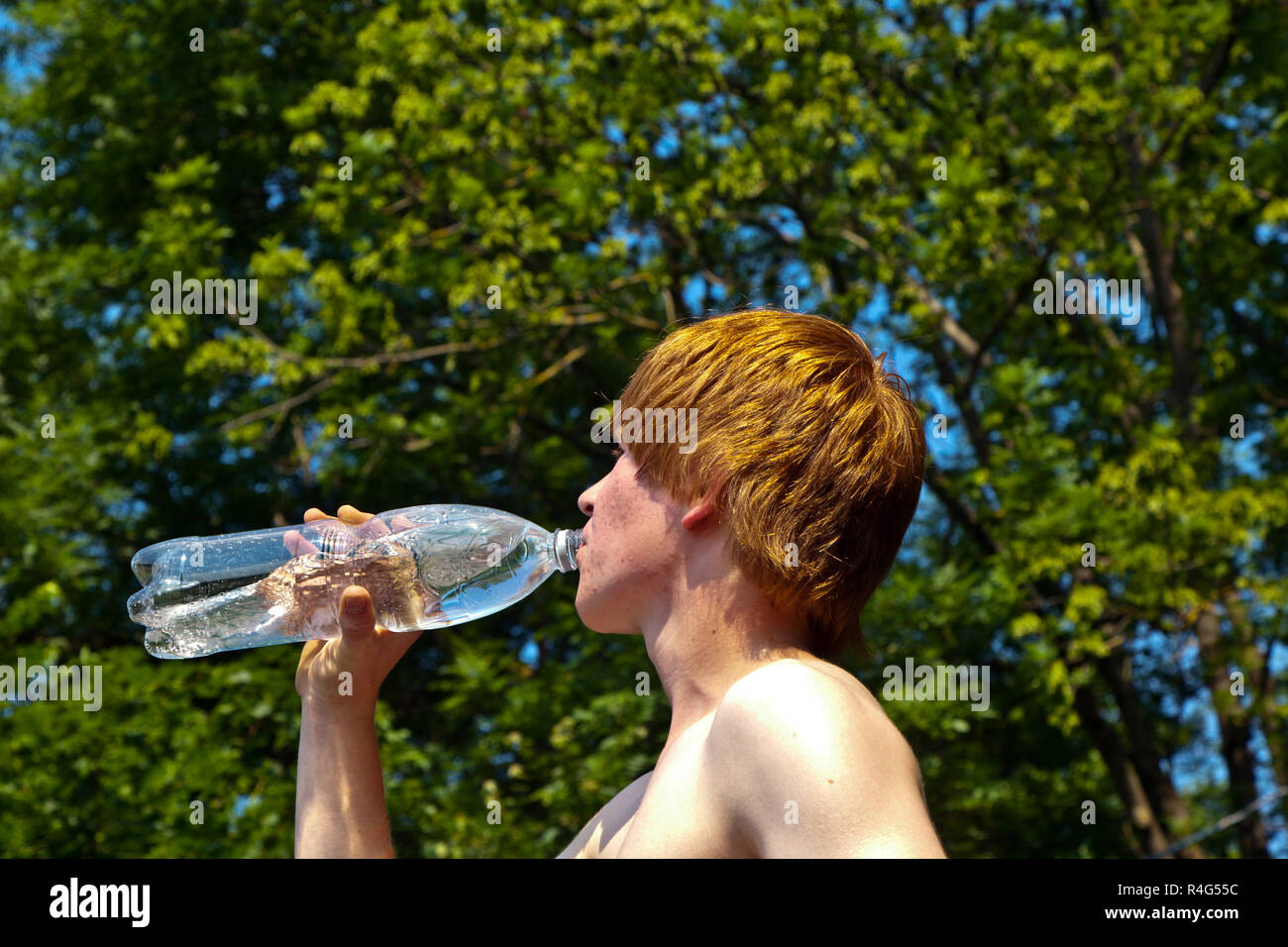 Child sweating drink water hi-res stock photography and images - Alamy