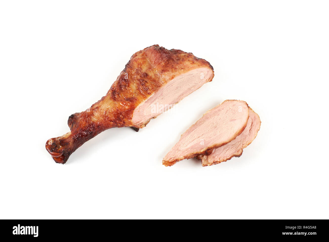 roast chickenleg and sliced chicken meat isolated on white background ...