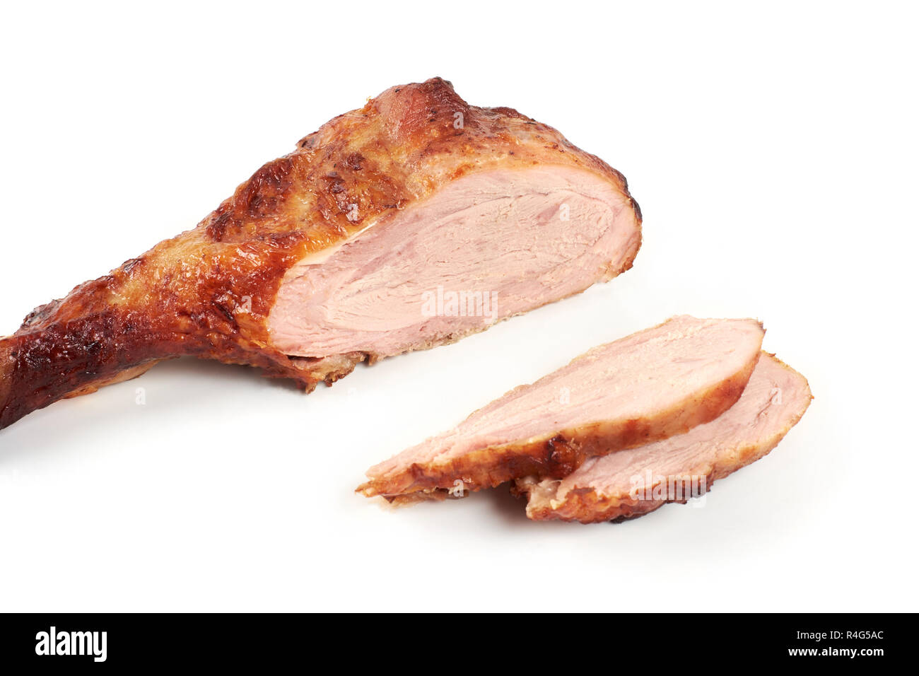 roast turkey leg and sliced turkey meat isolated on white background ...