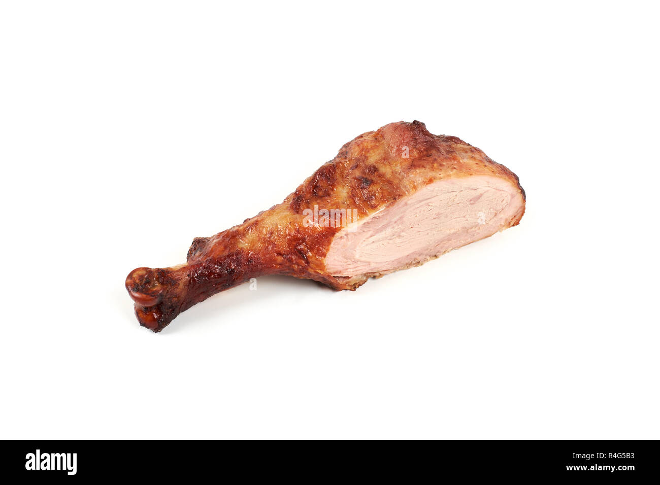roast and cuted turkey leg isolated on white background Stock Photo - Alamy