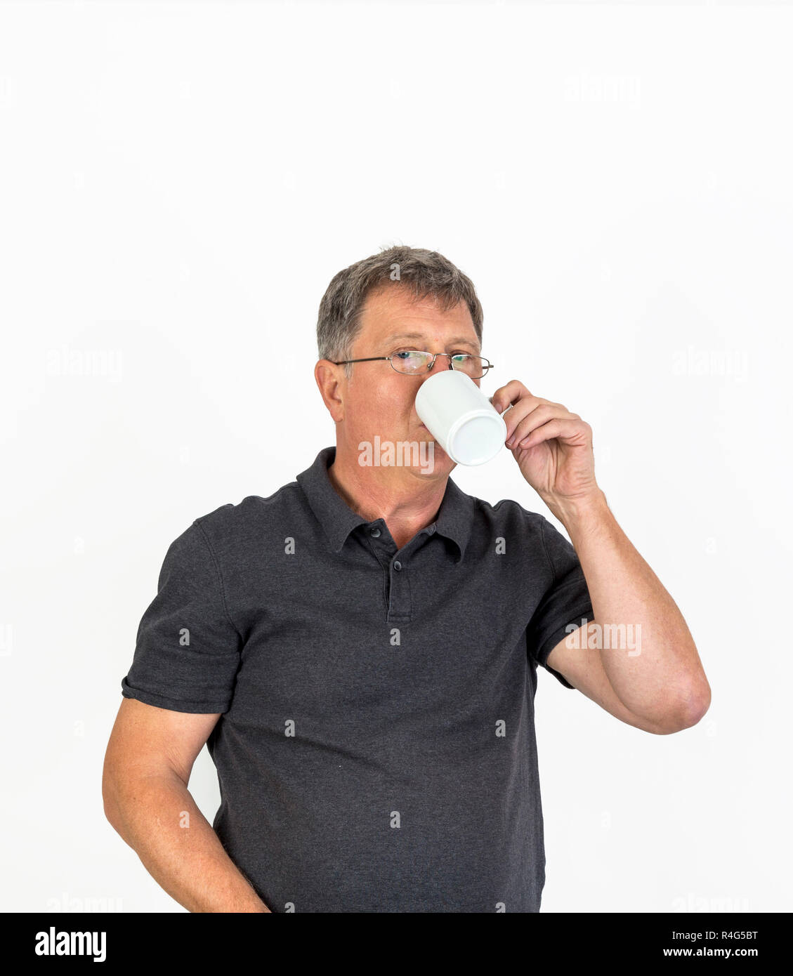 Man drinking coffee alert hi-res stock photography and images - Alamy
