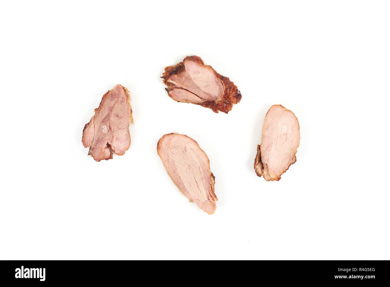 Slices of grilled turkey meat, isolated on white background Stock Photo ...