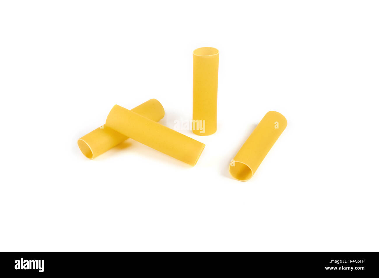 Italian cannelloni pasta tubes isolated over white background Stock ...