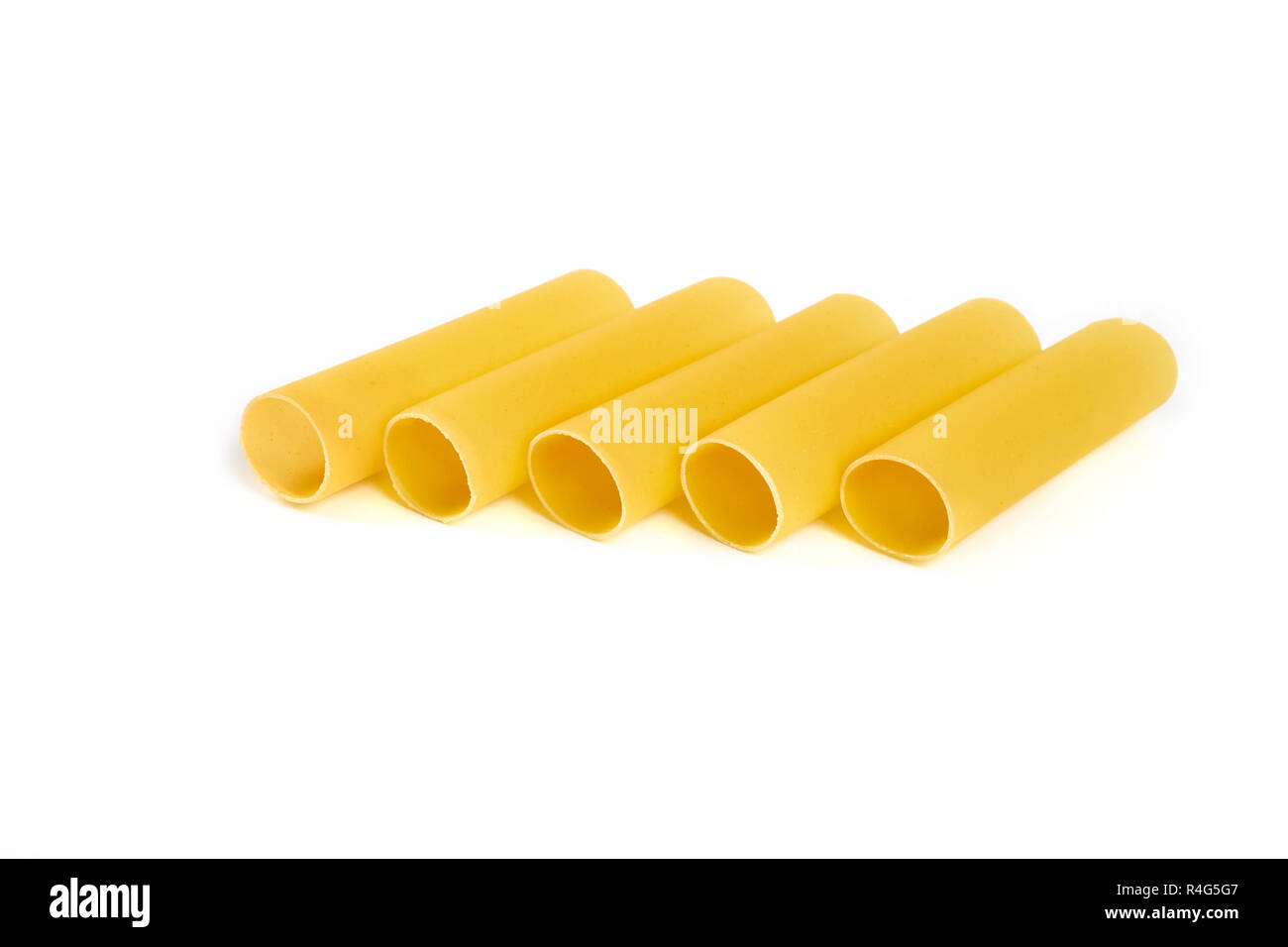 Italian cannelloni pasta tubes isolated over white background Stock ...