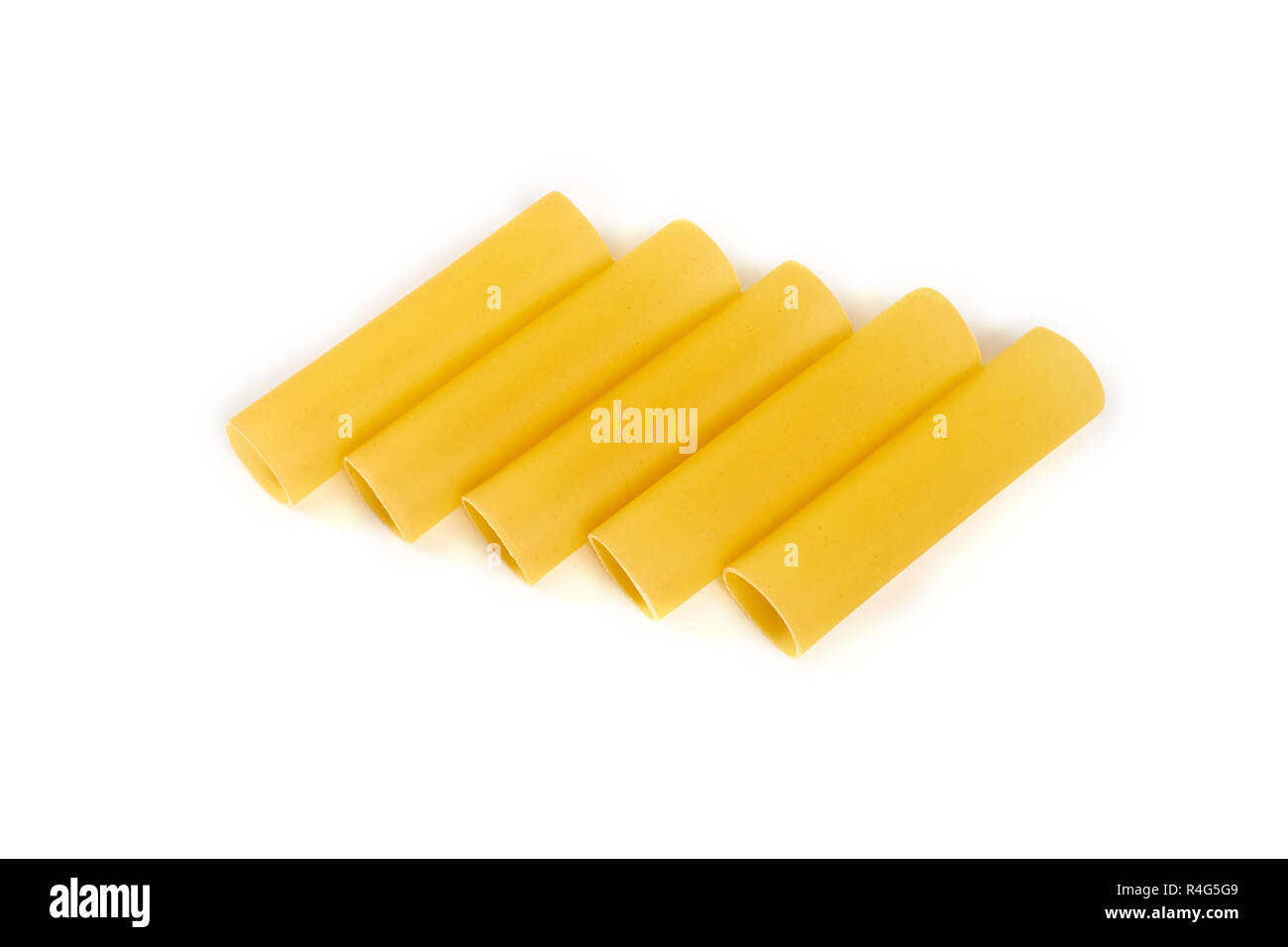 Italian cannelloni pasta tubes isolated over white background Stock ...