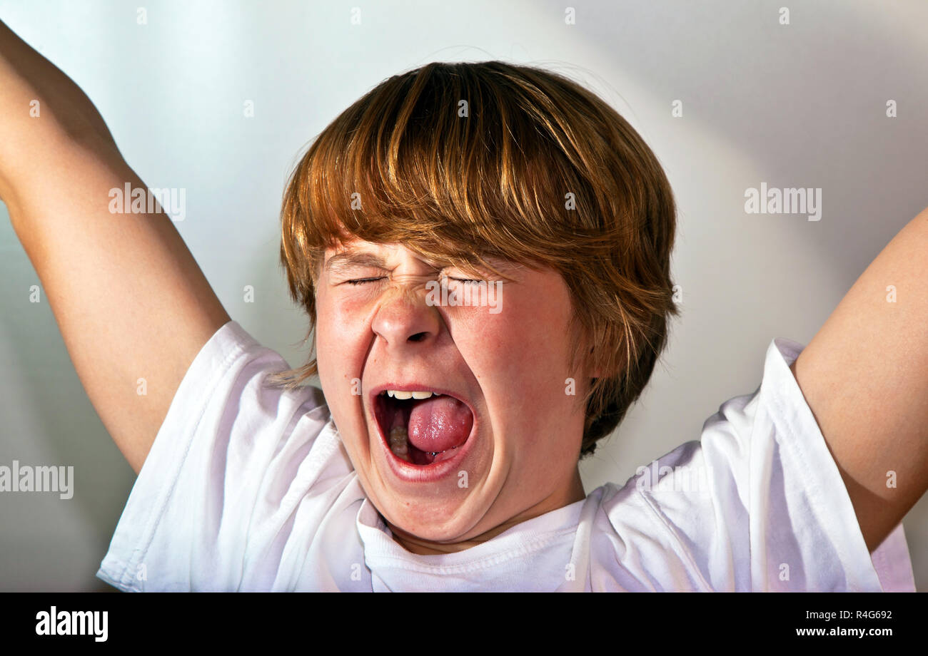 boy is crying with emotions Stock Photo - Alamy