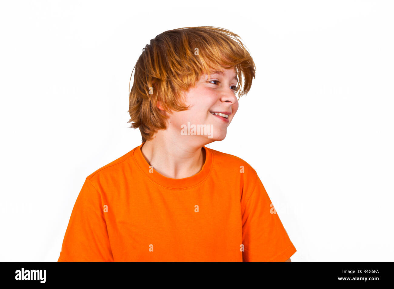 young smart boy has fun posing in studio Stock Photo - Alamy