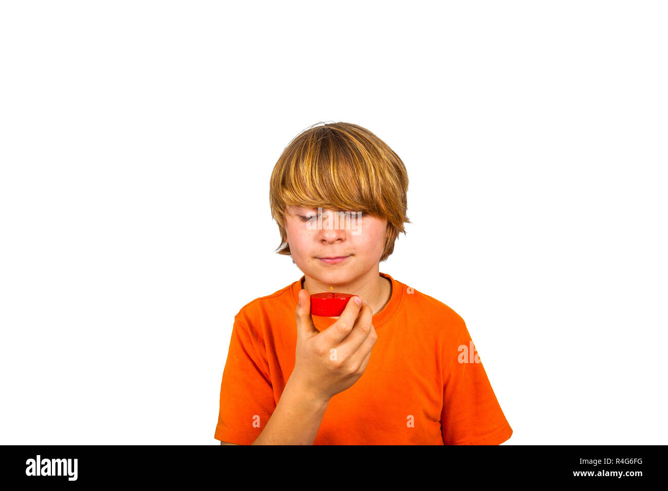 boy likes to play with matches and a candle Stock Photo - Alamy