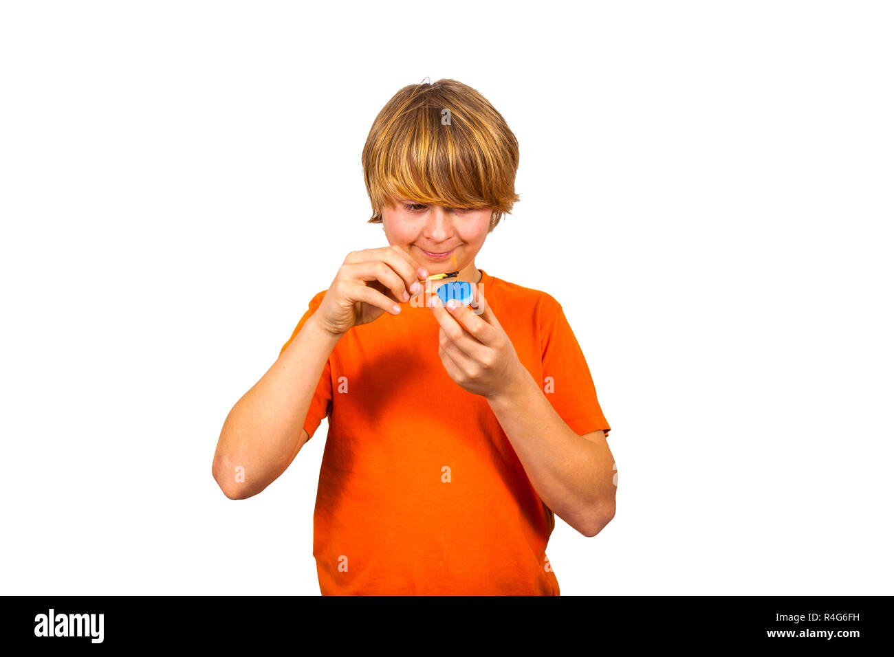 boy likes to play with matches and a candle Stock Photo - Alamy