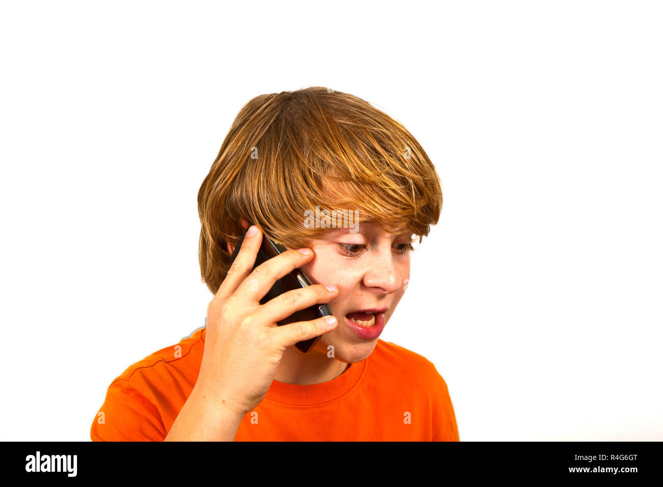 boy is using the mobile Stock Photo - Alamy