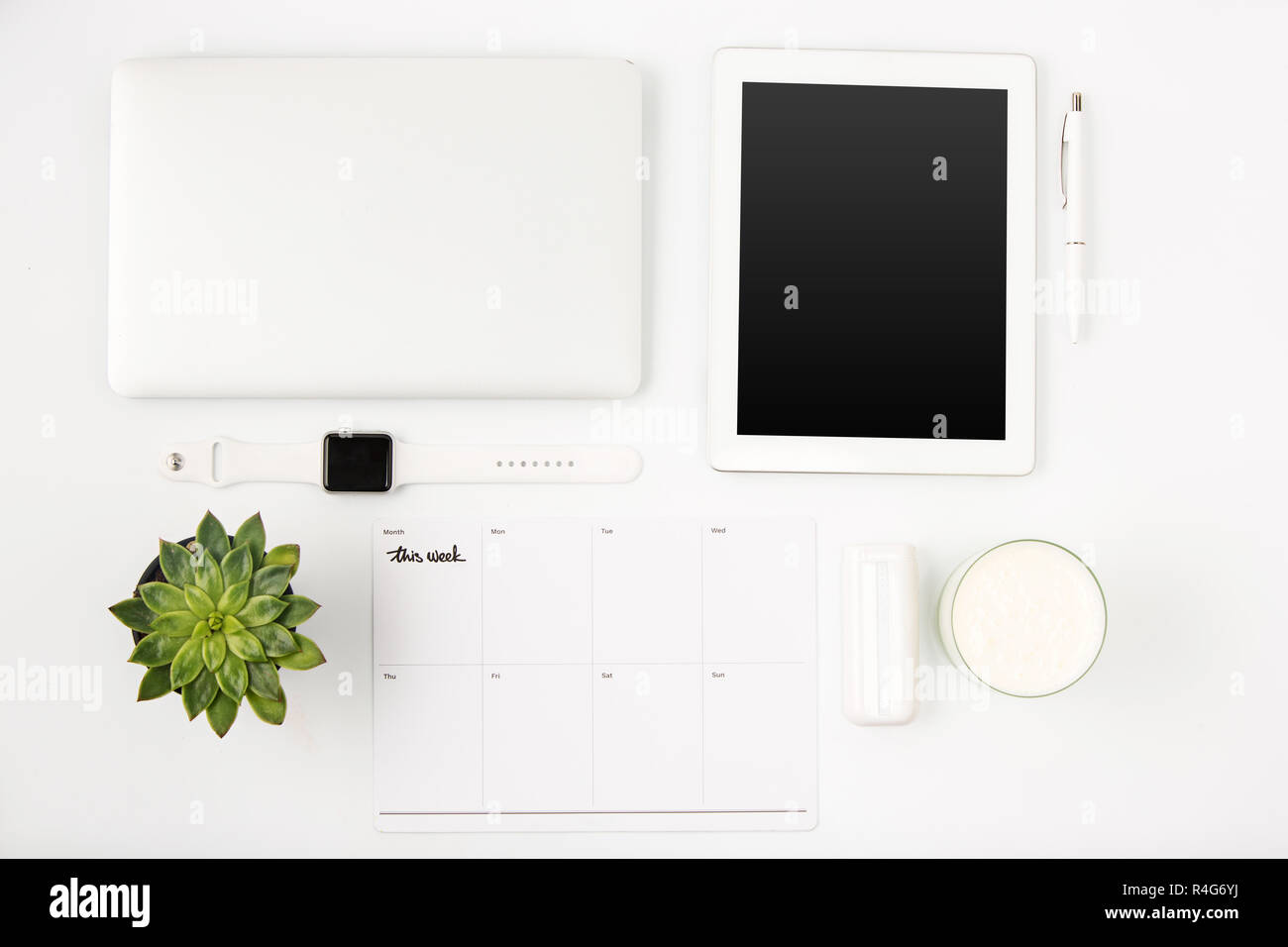 Top view of white office table with laptop Stock Photo - Alamy