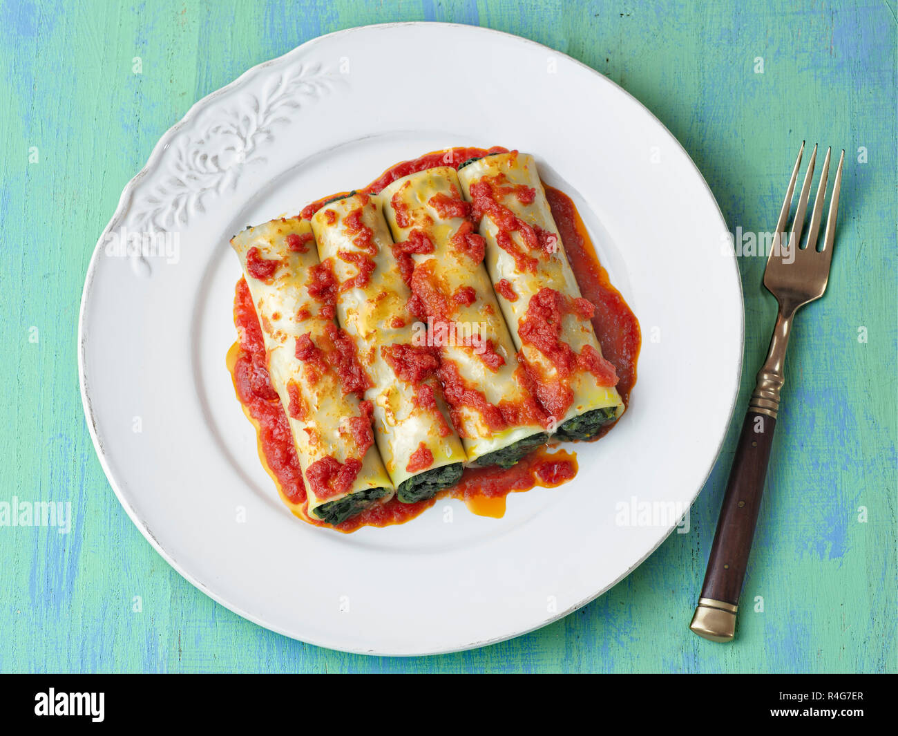 rustic italian vegetarian spinach cannelloni pasta Stock Photo - Alamy