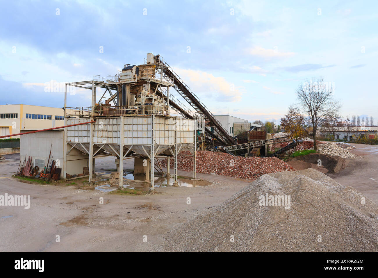 Stone quarry with silos Stock Photo - Alamy