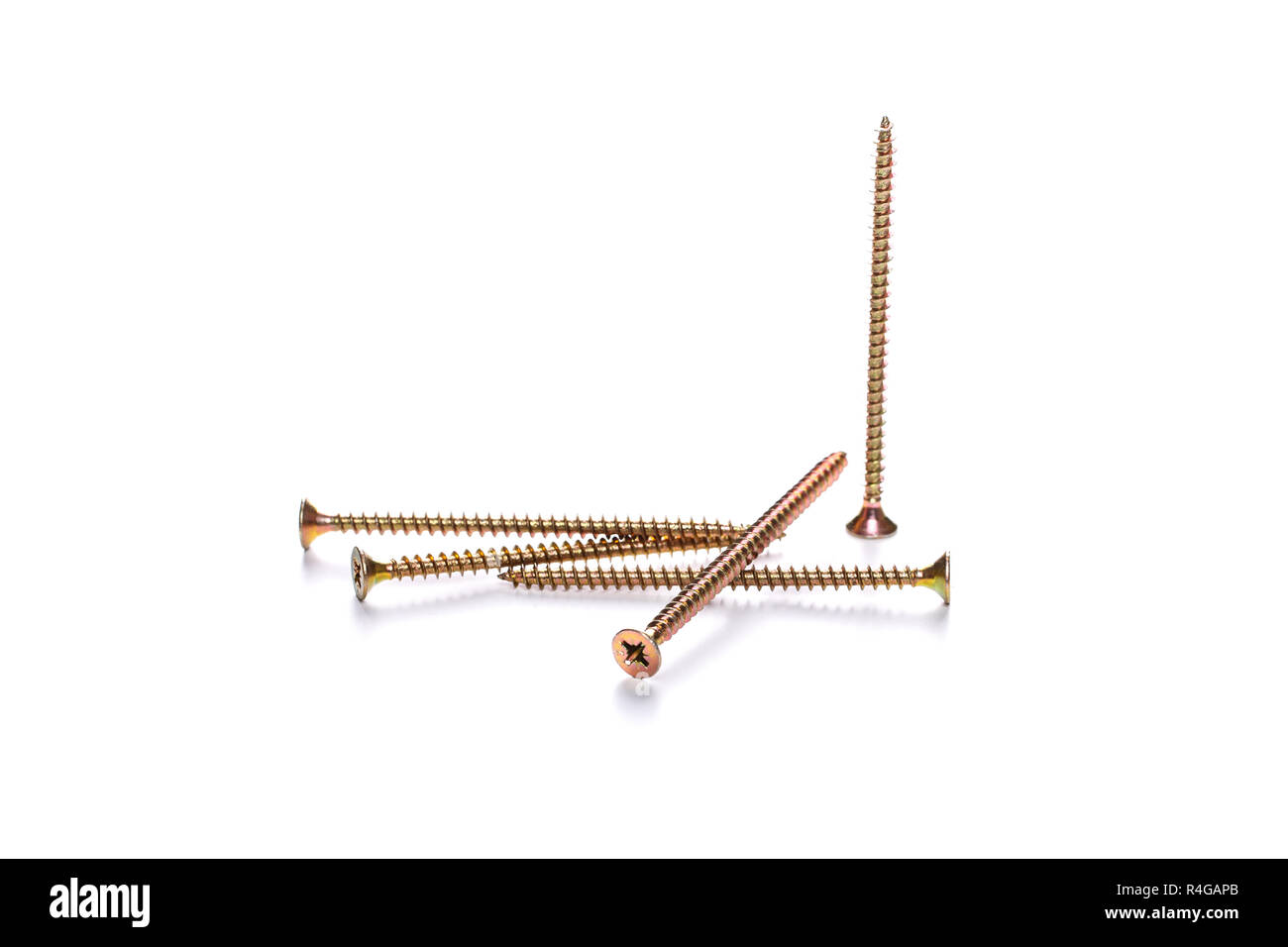 Photo of long yellow screws Stock Photo - Alamy