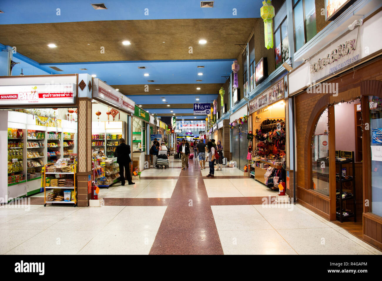 Thai people and foreign travelers walking visit and shopping in gift ...