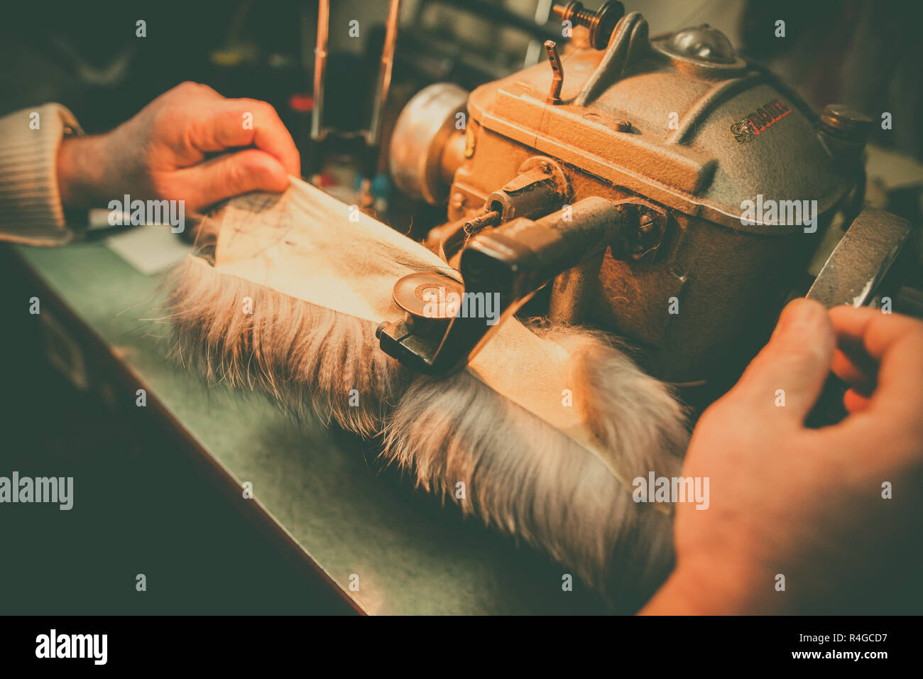 Fur sewing machine Stock Photo - Alamy