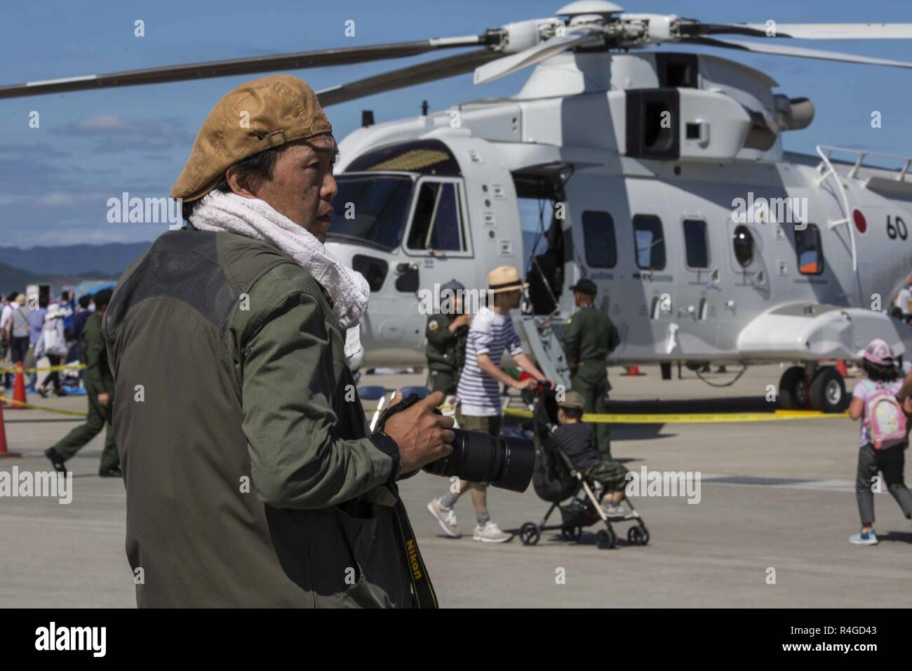 Japanese locals view various U.S. and Japanese static display aircraft ...